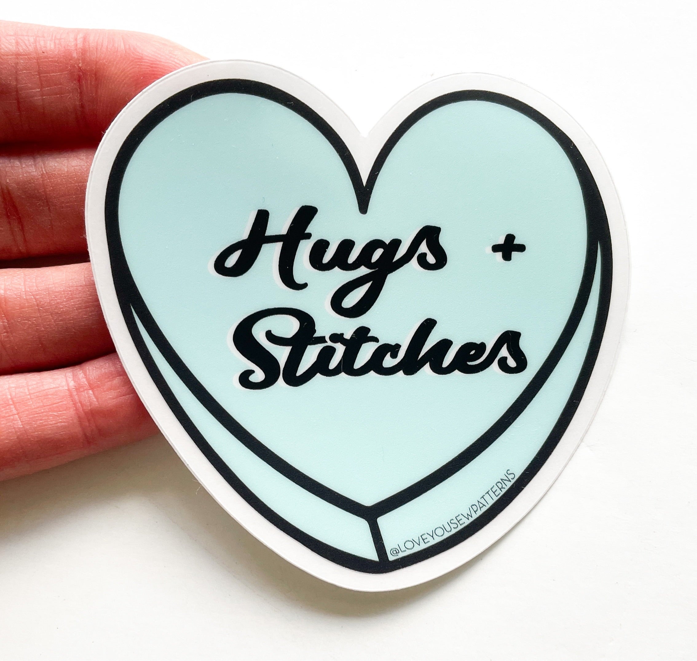 “Hugs + Stitches” Sticker – Love You Sew Patterns